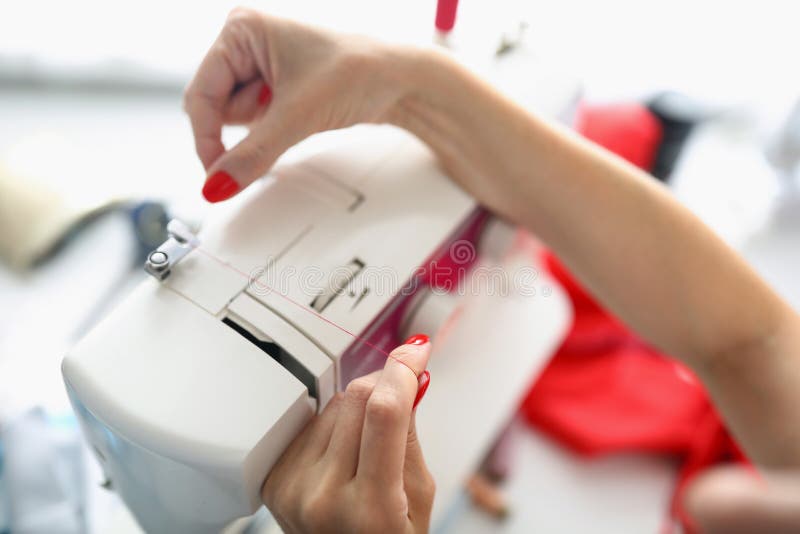 Female Hands Insert Thread into Sewing Machine Stock Photo - Image of ...