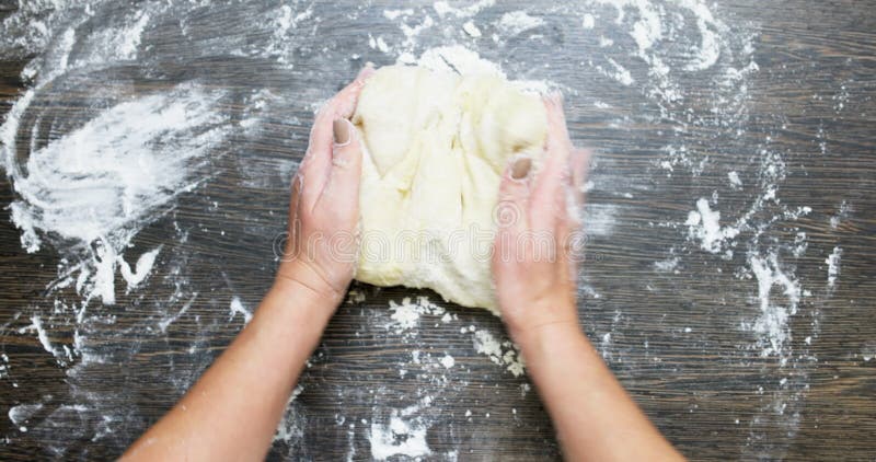 Female Hands Kneading Dough in Flour on the Table Stock Footage - Video ...