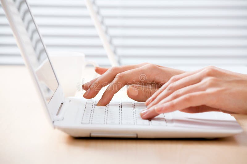 Female hands on laptop stock photo. Image of computer - 33763556