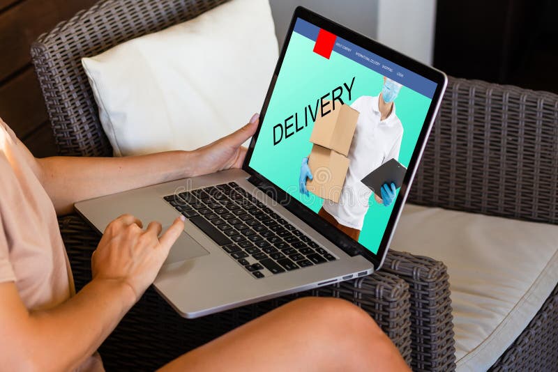 Female Hands on Laptop Computer with Parcel Delivery Application on ...