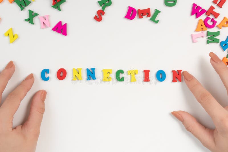 Female Hands Lay Out the Word Connection from Colored Letters Stock ...