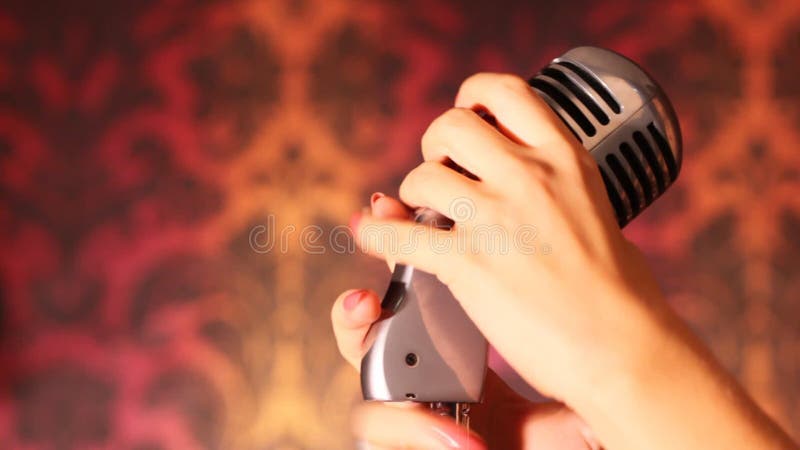 Female Hands Laying on Microphone on Rack with Stock Video - Video of ...