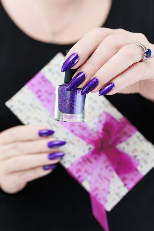 Female Hands with Long Nails Hold a Gift Box Stock Photo - Image of ...