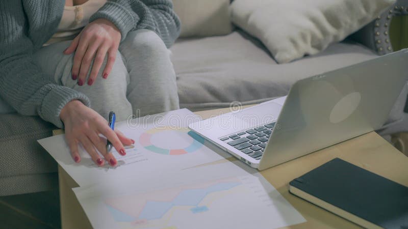 Female Hands Make Notes in Charts and Laptop Stock Image - Image of ...