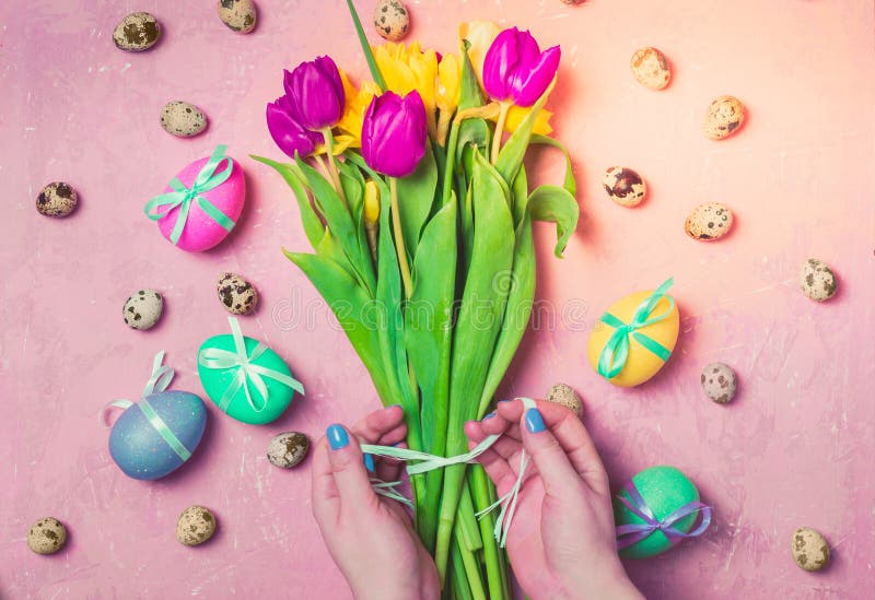 Female Hands Making Spring Tulips and Daffodils Bouquet. Easter ...