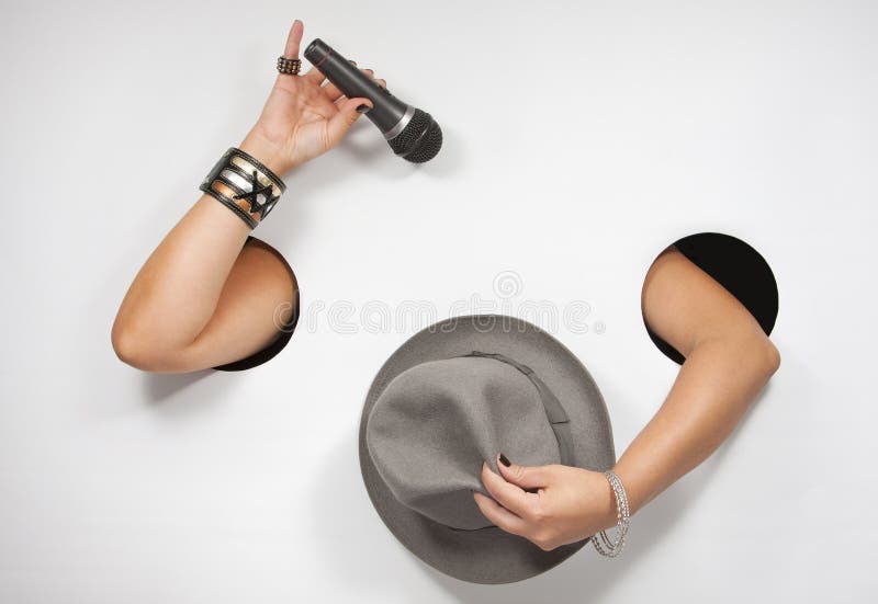 Female Hands with Microphone and Hat Stock Photo - Image of event ...