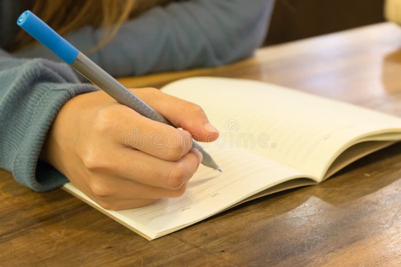 Female Hands with Pen Writing on Notebook Stock Image - Image of memo ...