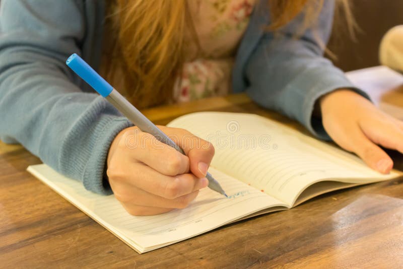Female Hands with Pen Writing on Notebook Stock Image - Image of ...