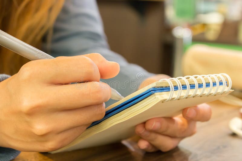 Female Hands with Pen Writing on Notebook Stock Photo - Image of ...