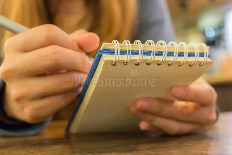 Female Hands with Pen Writing on Notebook Stock Photo - Image of ...