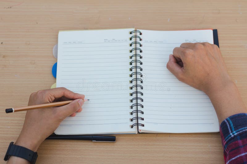 Female Hands with Pencil Writing on Notebook Stock Image - Image of ...