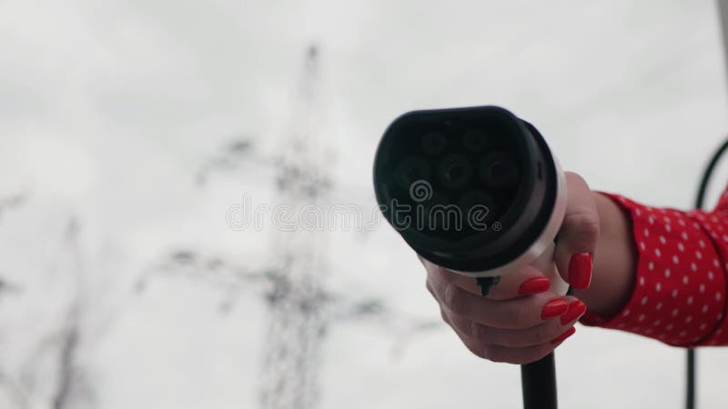 Female Hands Plugging in Cable Stock Video - Video of automobile ...