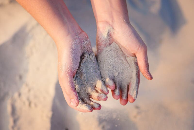 Female Hands Pour Sand on the Ground Stock Image - Image of ...