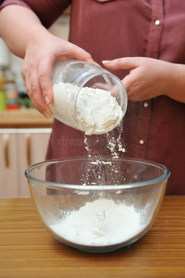 Pour The Flour In A Transparent Bowl For Making Dough, Freezing Stock ...