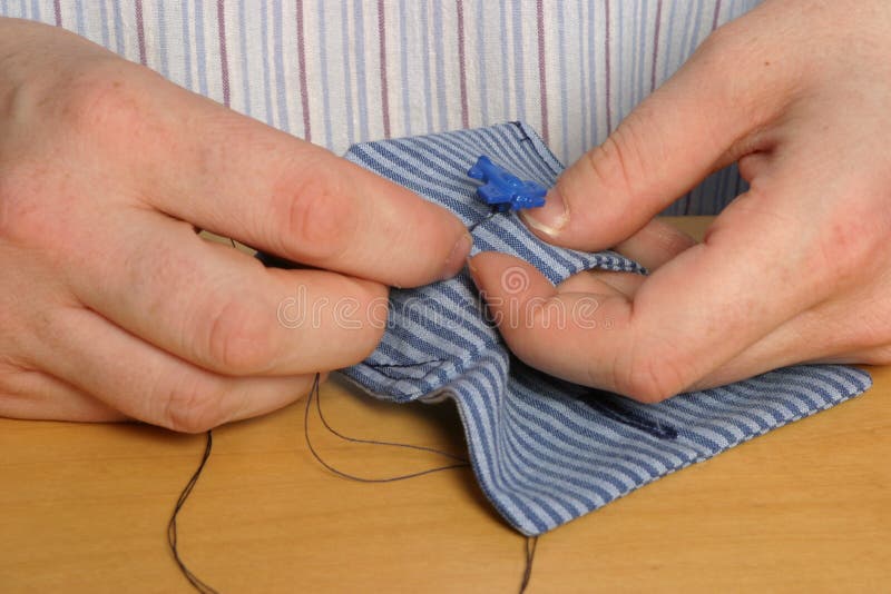 Female Hands Sewing a Piece of Cloth Stock Photo - Image of stitching ...