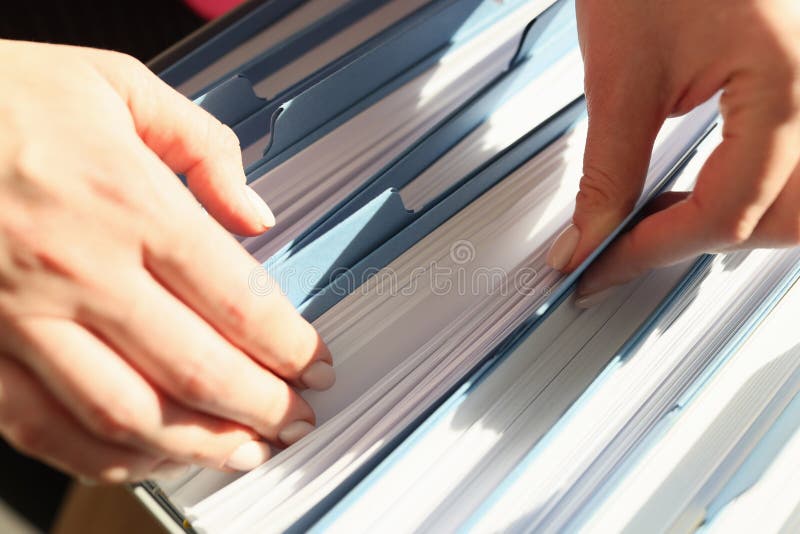 Female Hands Sort through Documents in a Folder, Close-up Stock Image ...
