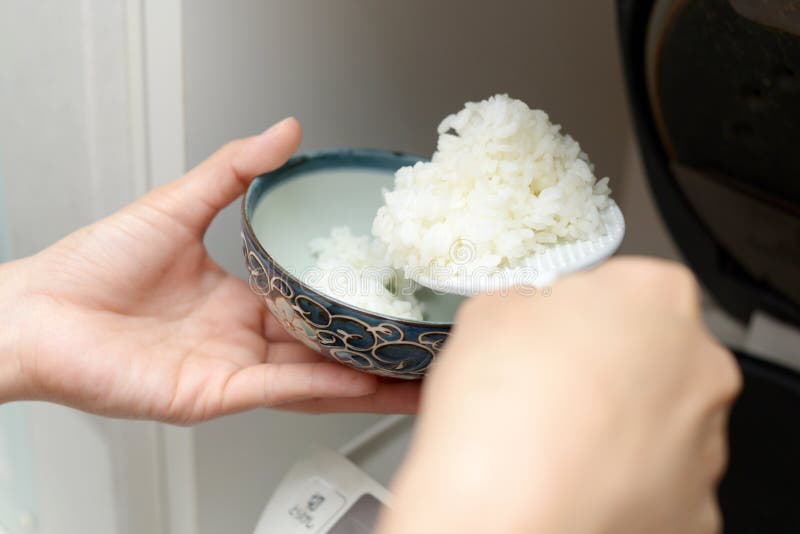 Stream Rice in Electric Rice Cooker Stock Photo - Image of mother, diet ...