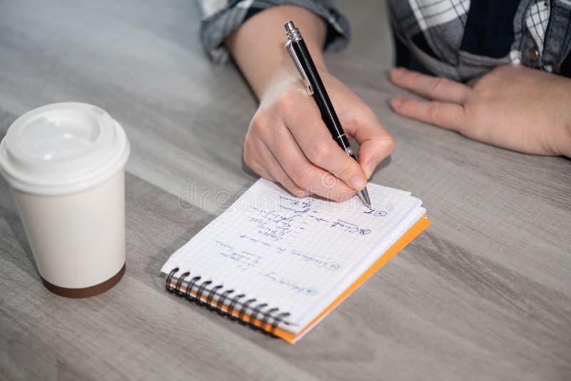 Female hands taking notes stock photo. Image of people - 186357550