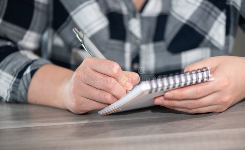 Female hands taking notes stock photo. Image of businesswoman - 188704418