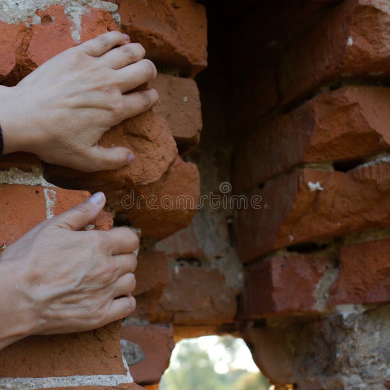 Hands on Old Red Brick Wall on Blurred Background Stock Photo - Image ...