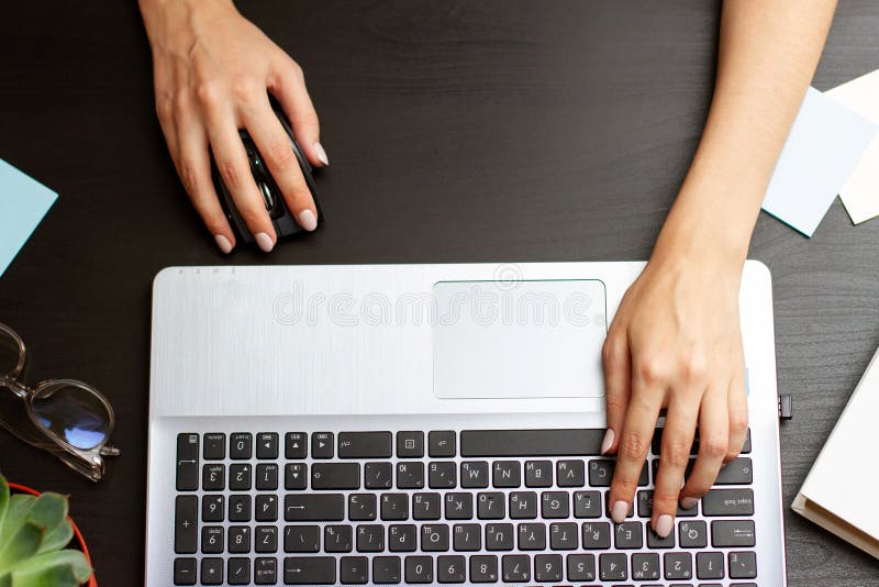 Female Hands Type on the Silver Keyboard. Working at Home with Laptop ...