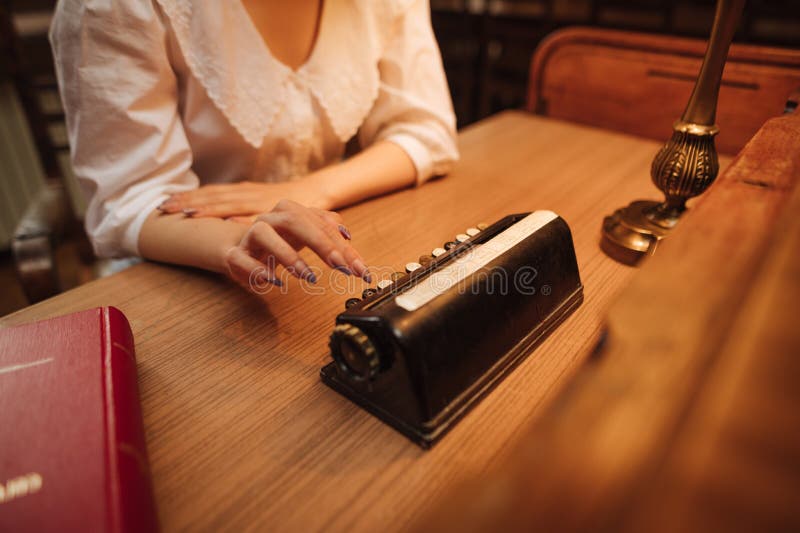 Female Hands Typing on a Desk in the Library Stock Photo - Image of ...