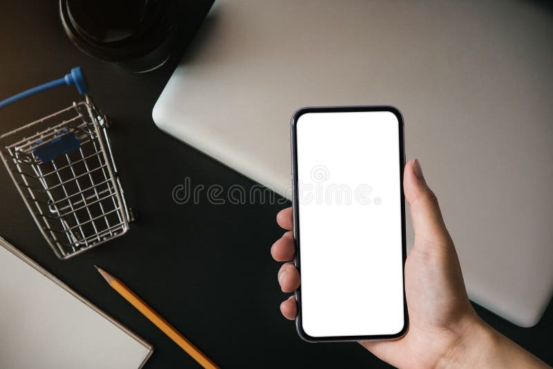 Female Hands Using a Smartphone Rather Than a Laptop with a Blank Dummy ...