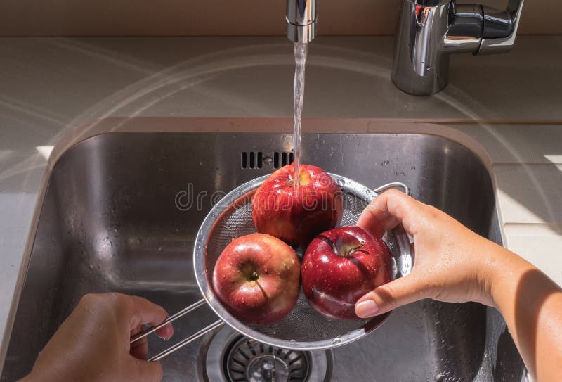 Female Hands Washing Red Apple in Water Stream Stock Photo - Image of ...
