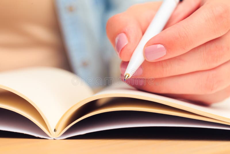 Female Hands Write in a Notebook . Office Place . Close Up View - Image ...