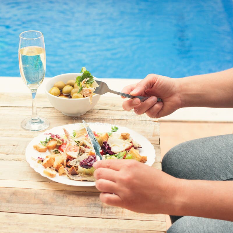 Female Having Dinner by the Pool Stock Photo - Image of alcohol ...