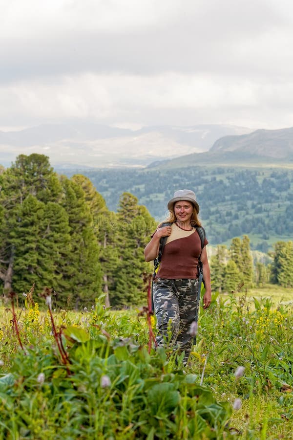 Female hiker with backpack stock image. Image of posing - 26507419
