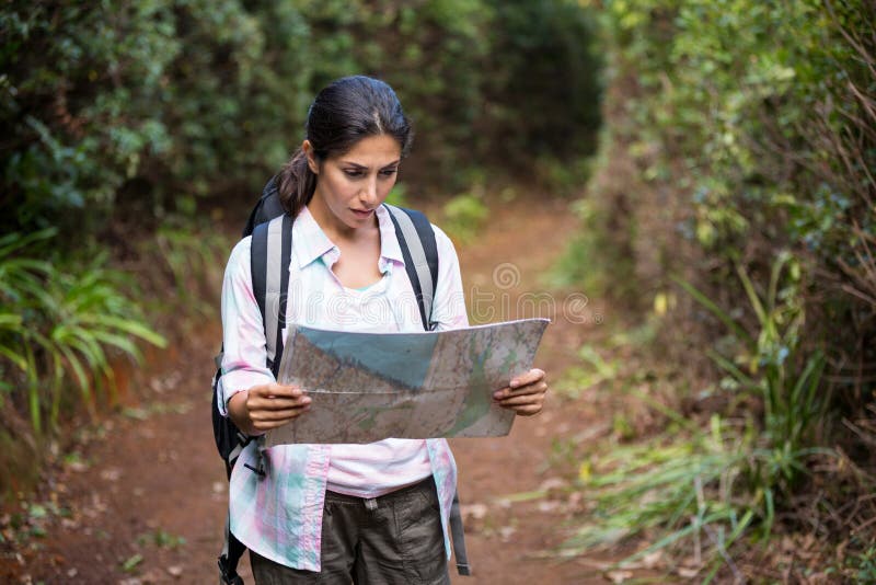 Female Hiker Looking at Map Stock Image - Image of beautiful, holding ...