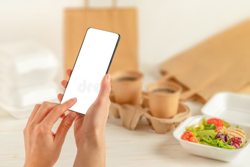 Female Holding Smartphone and and Makes an Online Order. Food Delivery ...