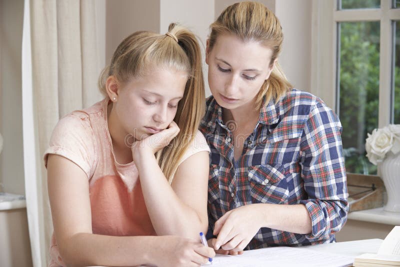 Female Home Tutor Helping Girl with Studies Stock Photo - Image of ...