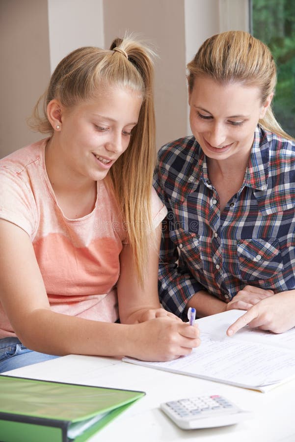 Female Home Tutor Helping Girl with Studies Stock Image - Image of ...