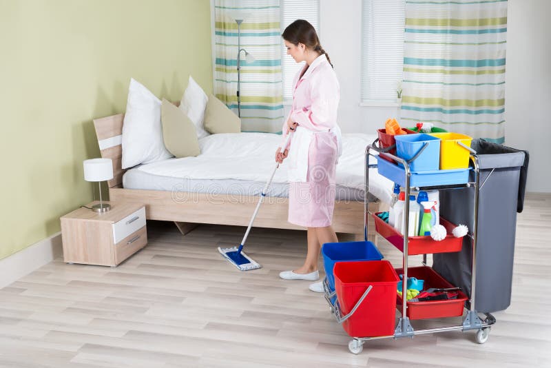 Female Housekeeper Mopping Floor Stock Photo - Image of house ...