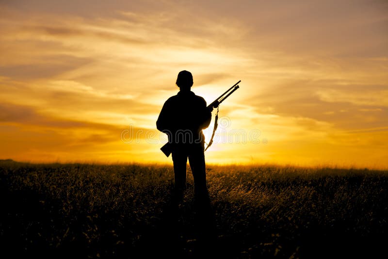 Hunter in Sunset stock photo. Image of weapon, hunting - 30229118