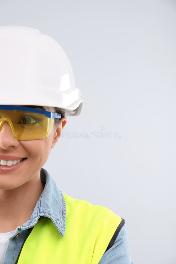 Female Industrial Engineer in Uniform on Light Background Stock Image ...