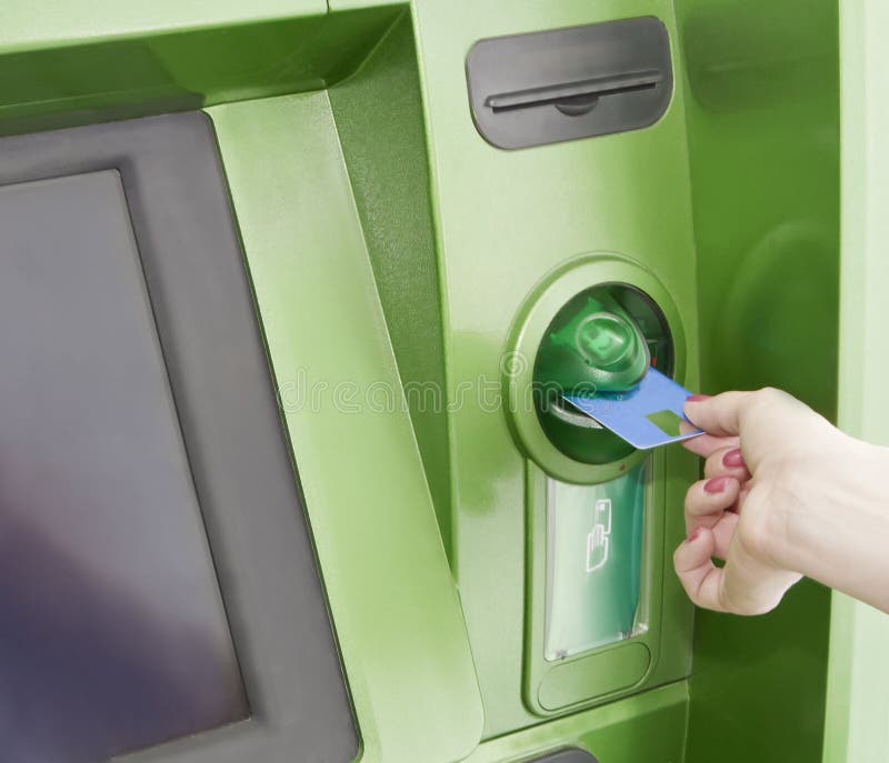 Male Hand Businessman Inserts Credit Card into the ATM Stock Image ...