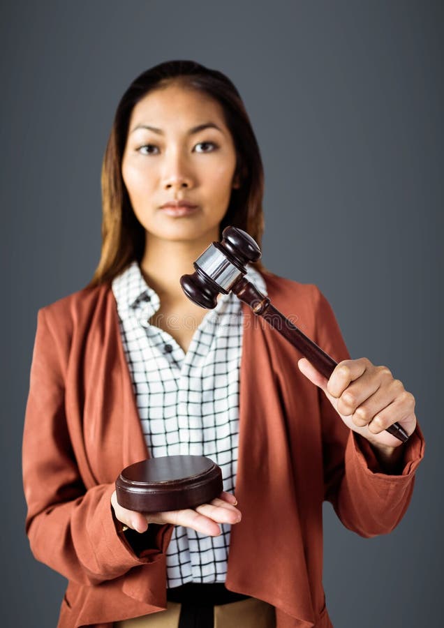 Female Judge with Gavel Against Grey Background Stock Photo - Image of ...