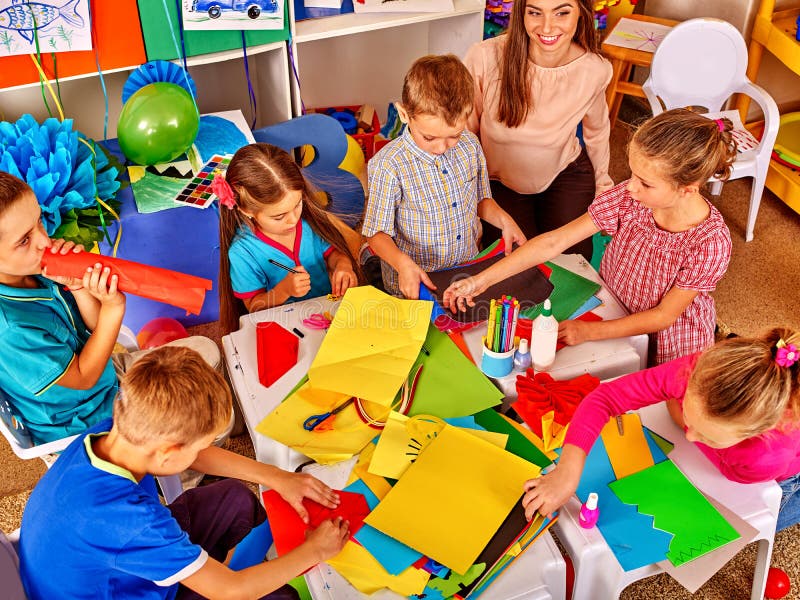 Female Kid Work with Colored Paper in Beginner School. Stock Photo ...