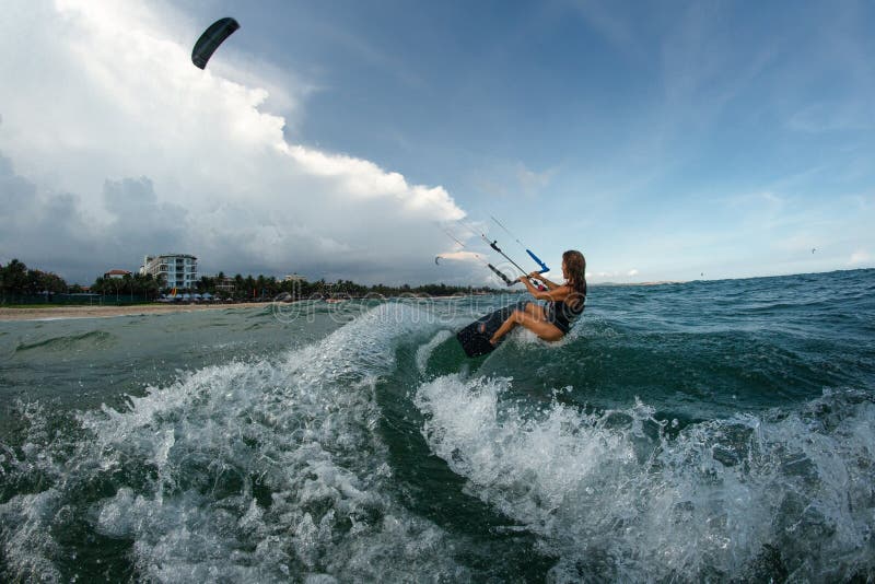 Kite Surfer Riding a Kite Board on the Sea with Splash Stock Image ...
