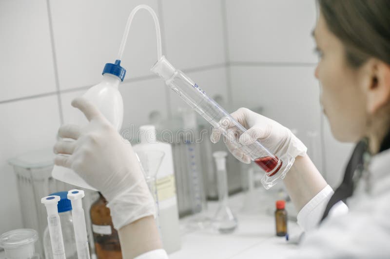 Female Laboratory Researcher Performs Tests Stock Photo - Image of ...