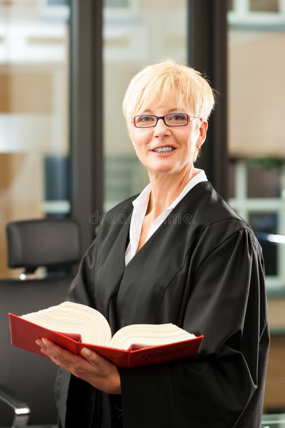 Female Lawyer with German Civil Code Stock Photo - Image of robe ...