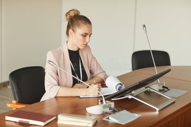 Female Leader Sitting at Conference Table Stock Photo - Image of modern ...