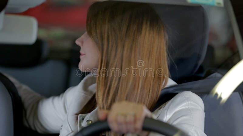 Female Leans and Drives Backwards Stock Footage - Video of windshield ...