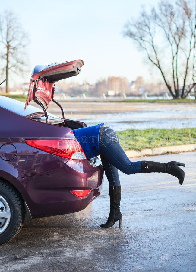 Female legs from car trunk stock photo. Image of funny - 28772026