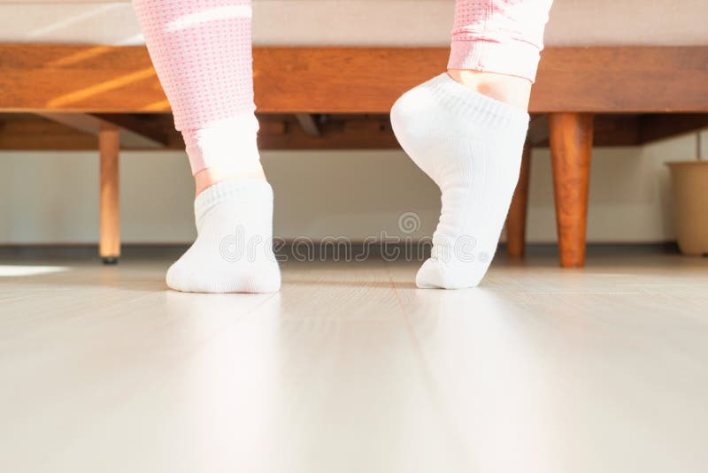 Female Legs Doing Exercises and Stretching Feet Front View. Stock Image ...