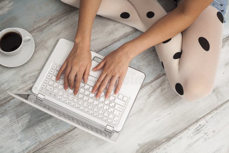 Female Legs on a Floor with Computer Laptop Stock Photo - Image of ...