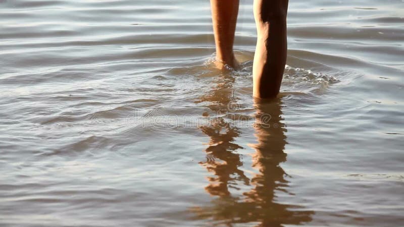 Female Legs Feet Close-up Stepping through Puddles Wet Road Bubbles ...